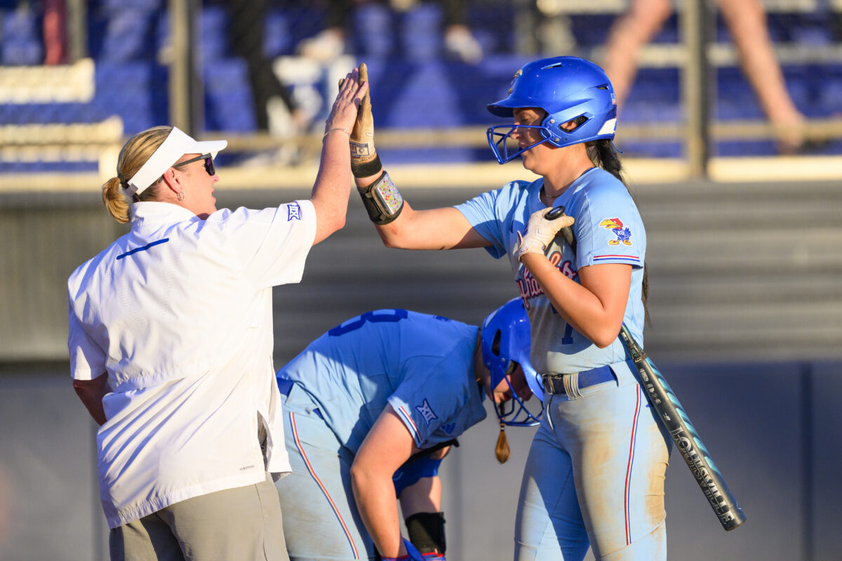 After picking up speed in nonconference play, KU softball opens Big 12 ...